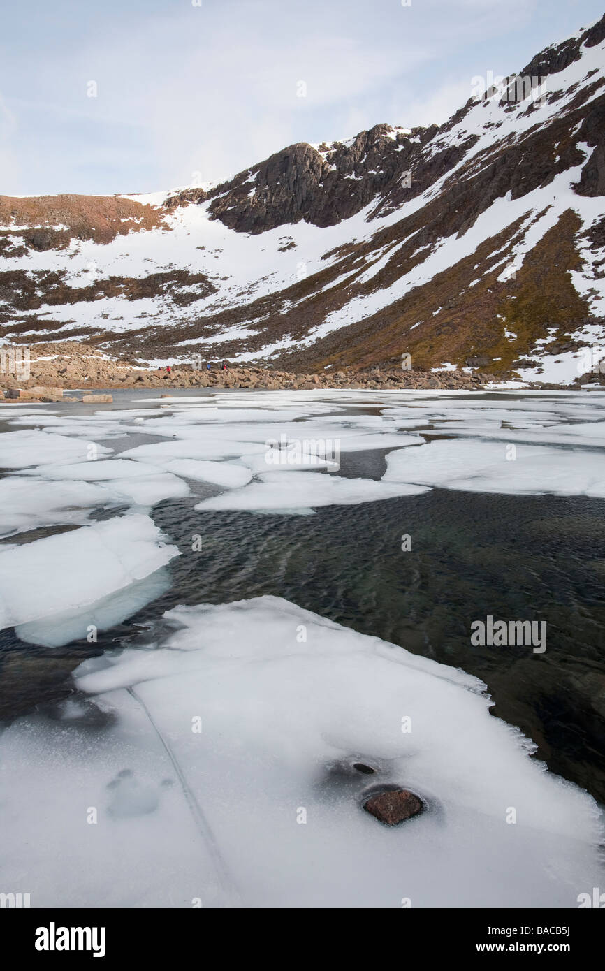 A frozen lochan in Corrie an Lochain in the Cairngorm mountains ...