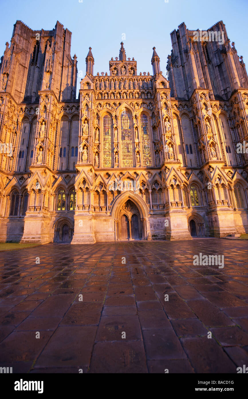 City of Wells, England. Rainy night view of the West Front and Nave ...