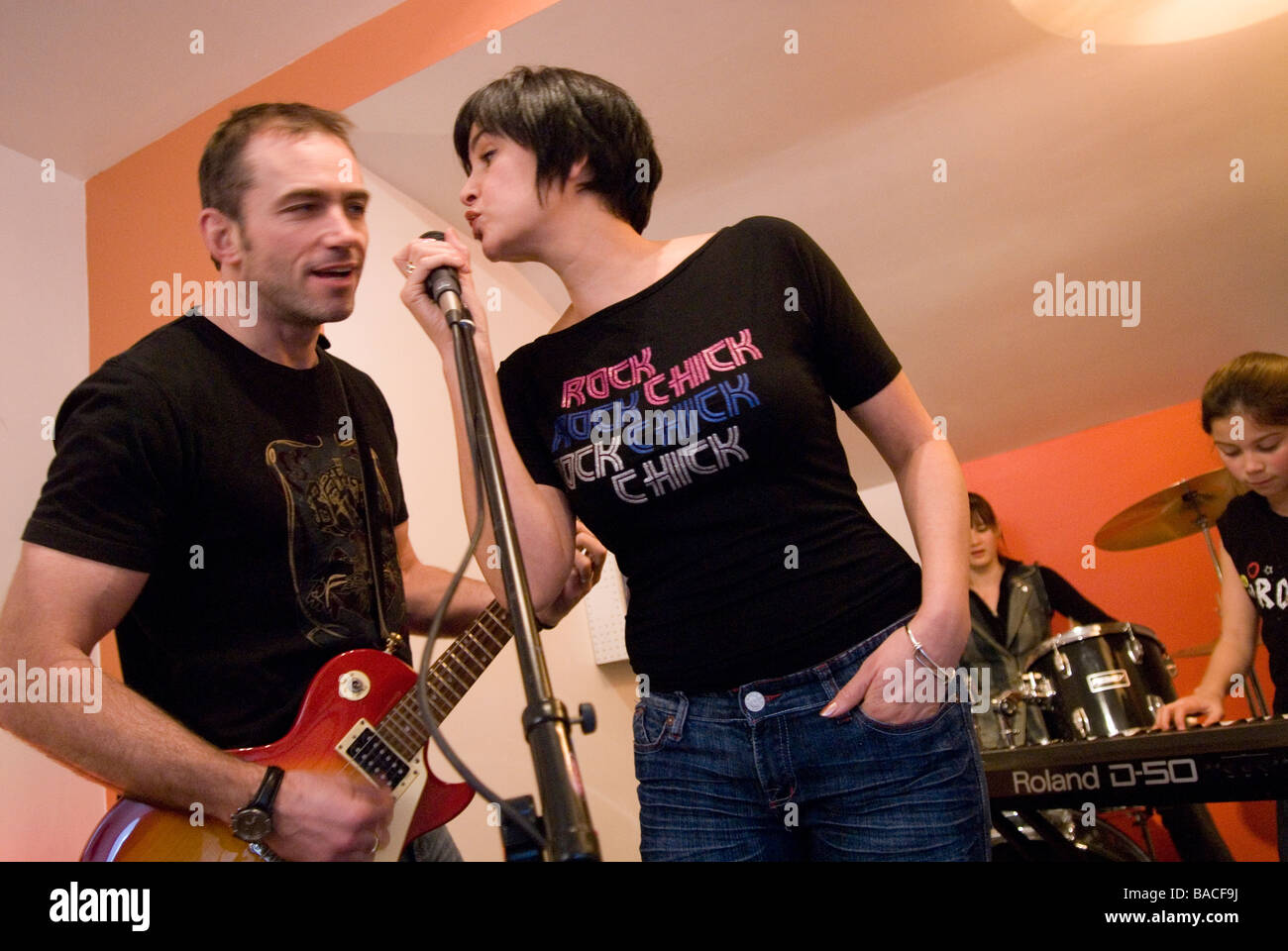 Family performing in a musical band Stock Photo - Alamy