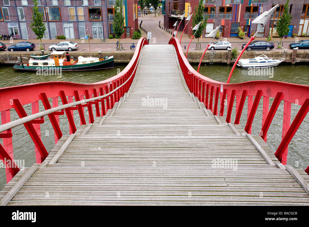 Netherlands, Northern Holland Province, Amsterdam, footbridge between ...