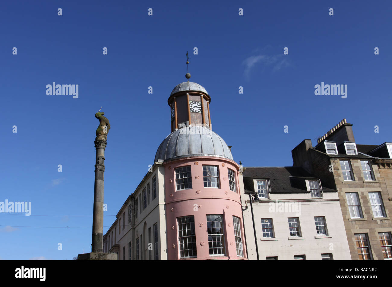 statue on column with round corner tower Cupar Fife Scotland March 2009 ...