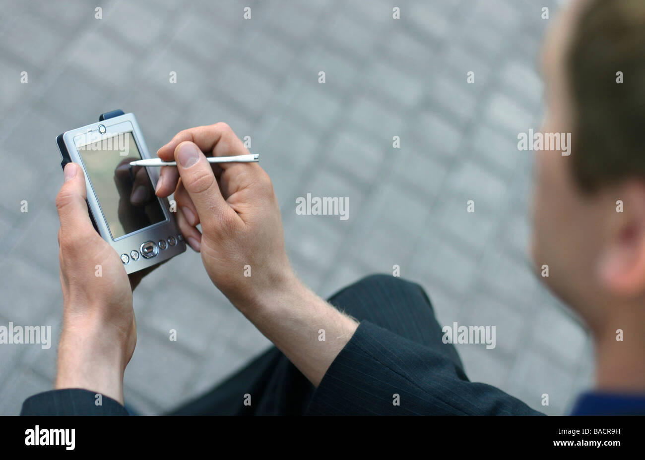 Busily hi-res stock photography and images - Alamy