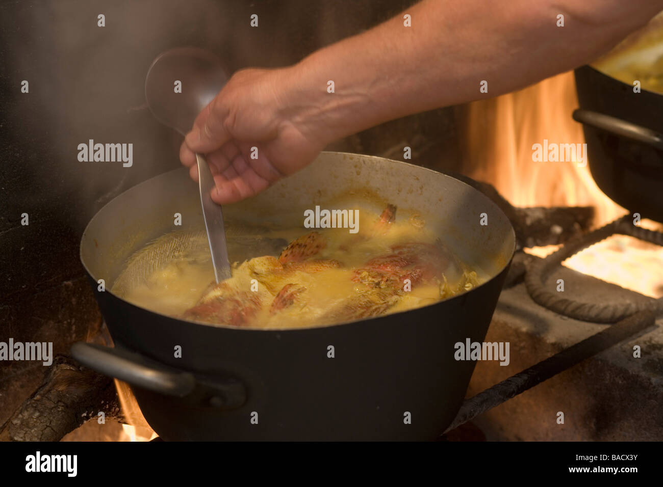 France, Var, Ramatuelle, Bouillabaisse cooked on firewood, Chez Camille ...