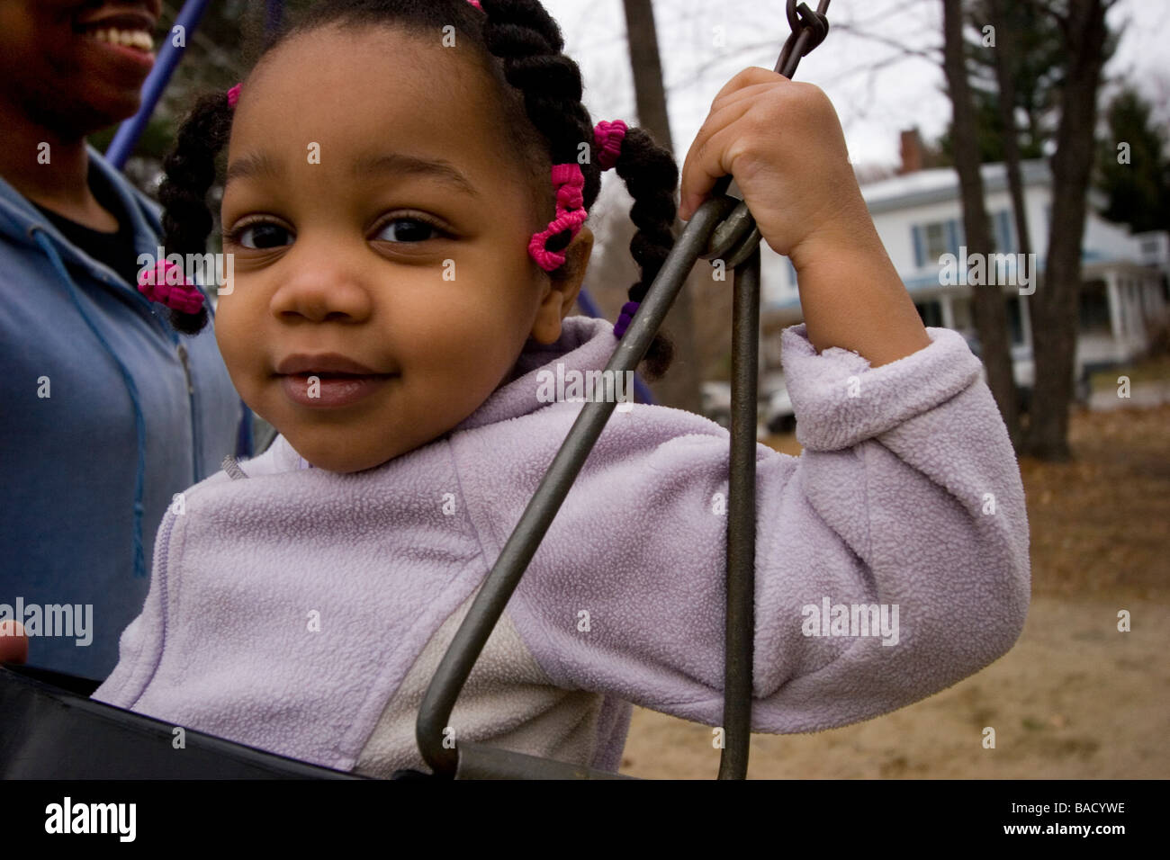 Child pushed on swing hi-res stock photography and images - Alamy