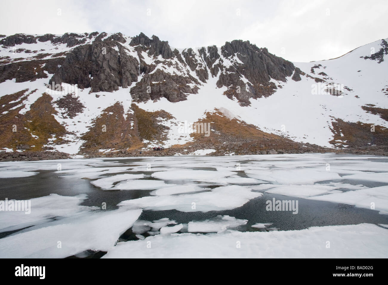 A frozen lochan in Corrie an Lochain in the Cairngorm mountains ...