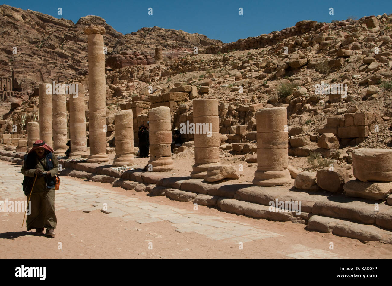 A Jordanian man walking at the ancient Colonnaded Street in the ancient ...