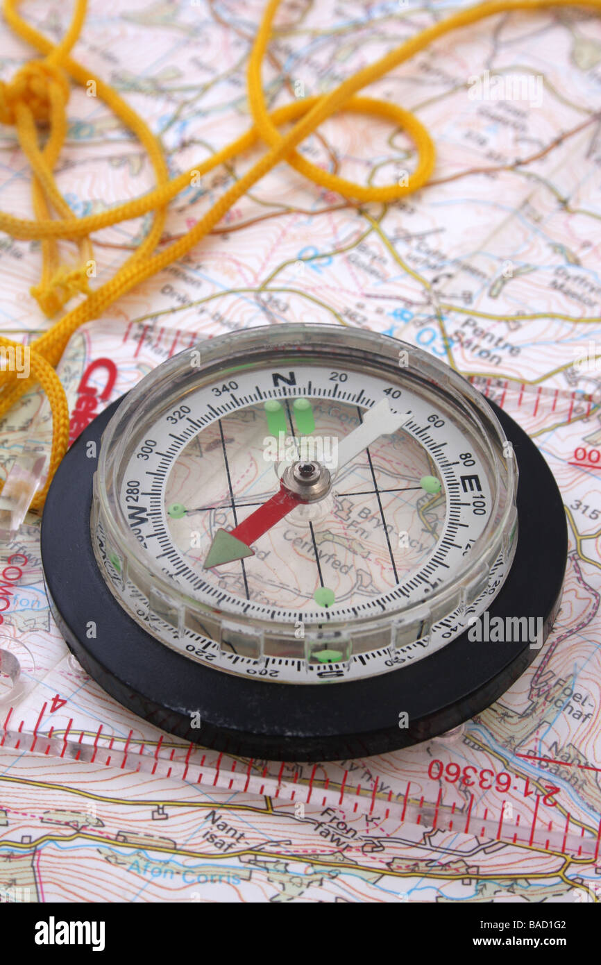 compass on an open map Stock Photo - Alamy