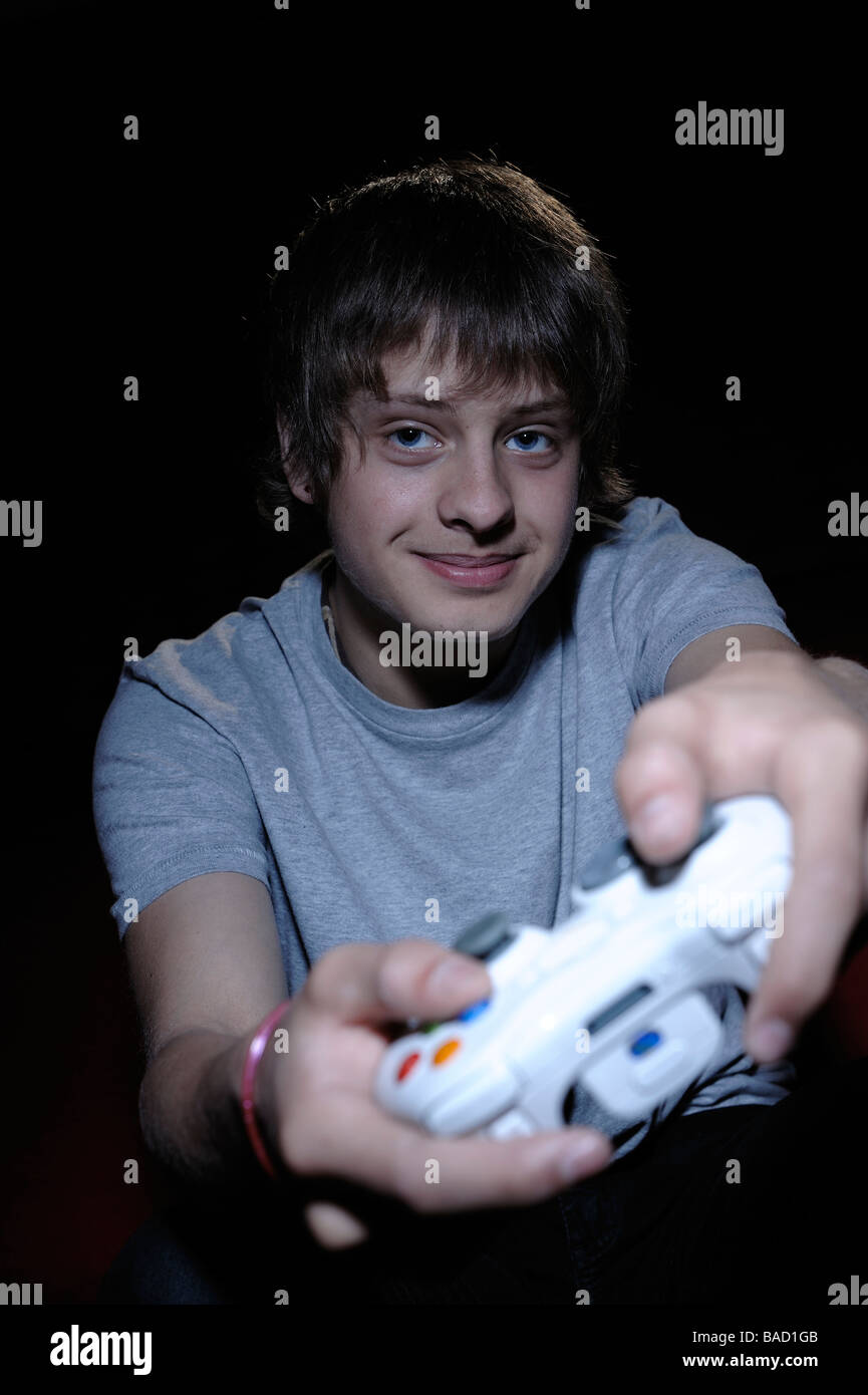Boy with computer games controller Stock Photo - Alamy
