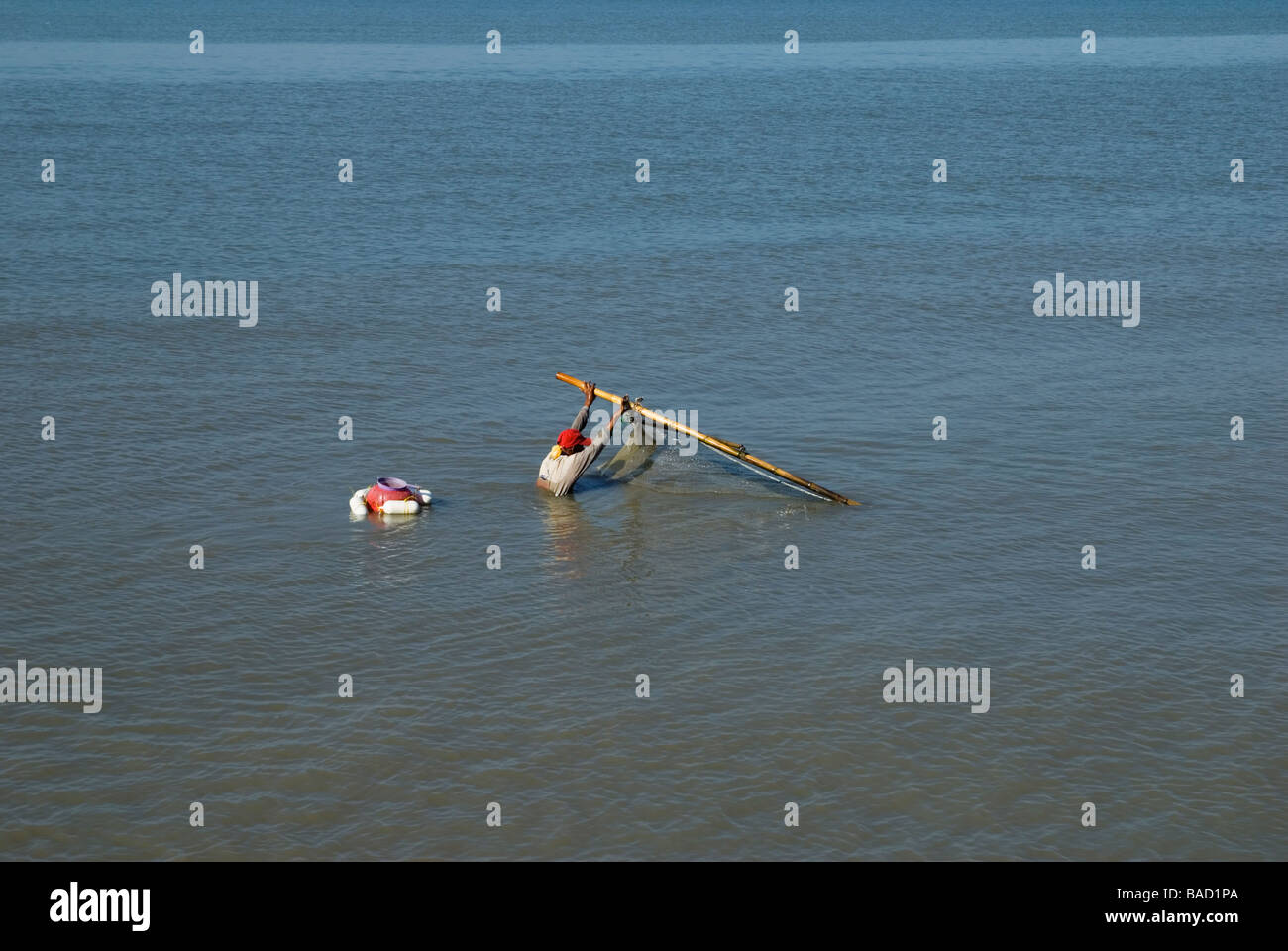 Traditional fishing using a triangular net off the coast of Malacca ...