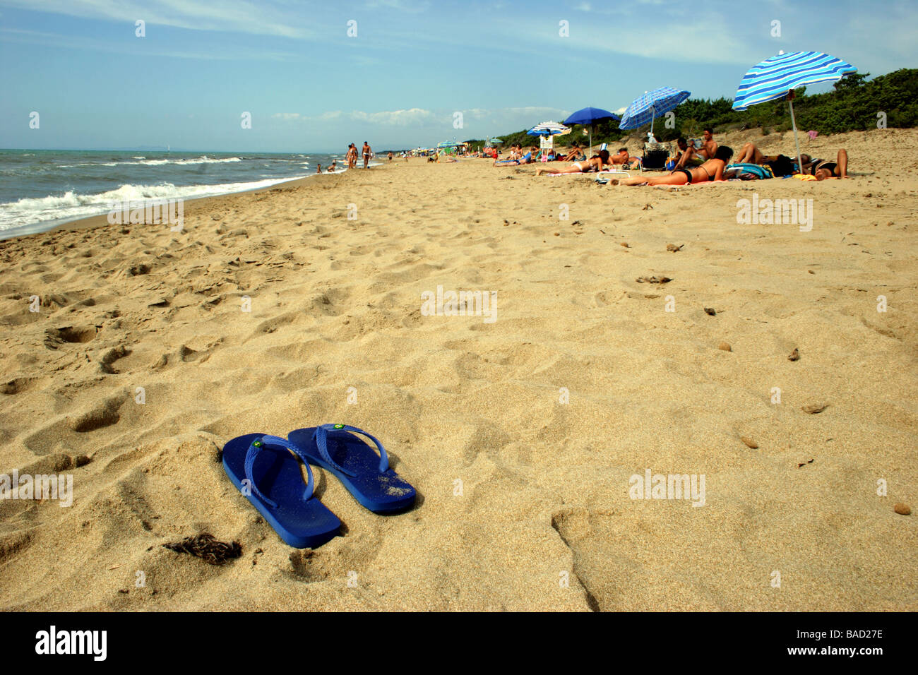 Flip-flops in the sand-perspective Stock Photo - Alamy
