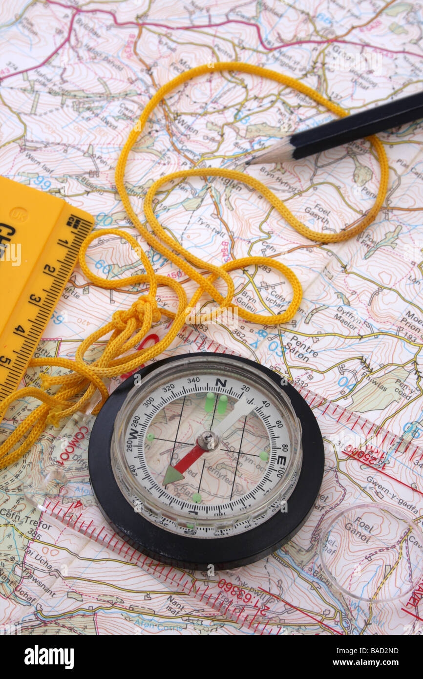 compass on an open map Stock Photo - Alamy