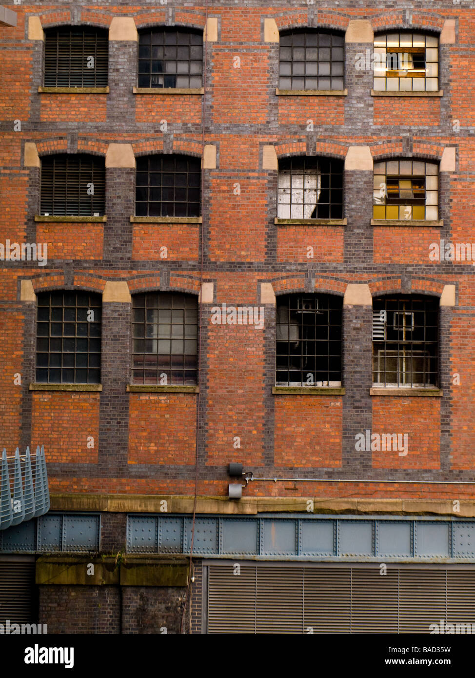 Old Red Brick Warehouse Building with WIndows Stock Photo - Alamy