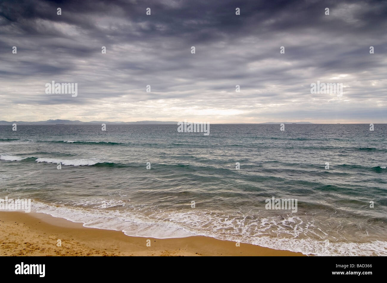 Storm clouds over water Stock Photo - Alamy