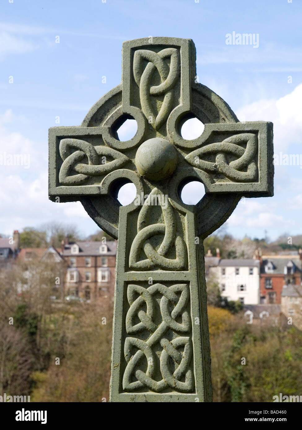 Close up of a large stone cross in the grounds of Durham Cathedral ...