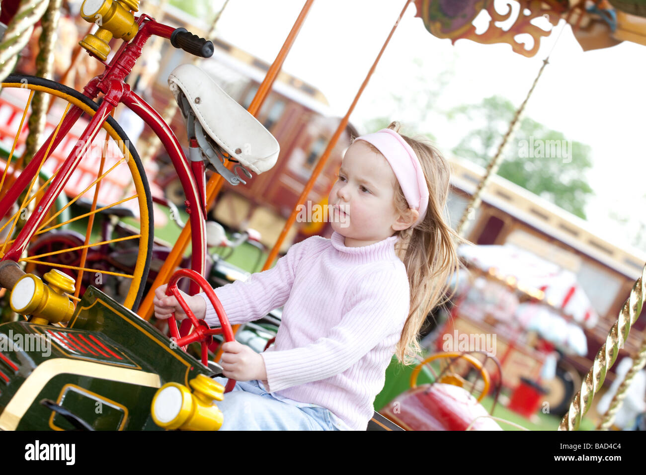 Child on a fairground ride Stock Photo - Alamy