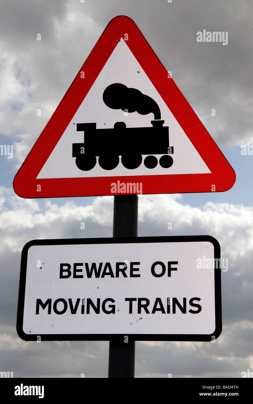 Beware of moving trains sign, Ipswich, Suffolk, UK Stock Photo - Alamy