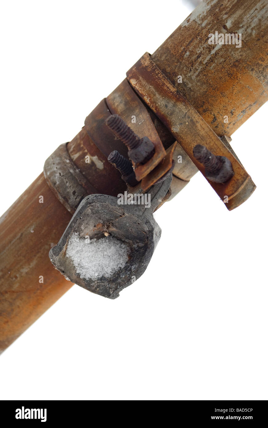 A rusty iron pole crosses a snowy background Stock Photo - Alamy