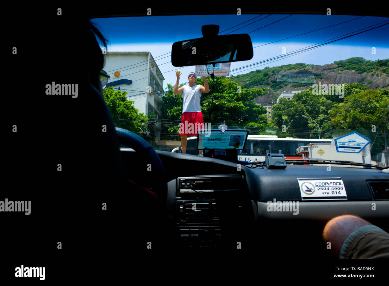 Busking at traffic lights hi-res stock photography and images - Alamy