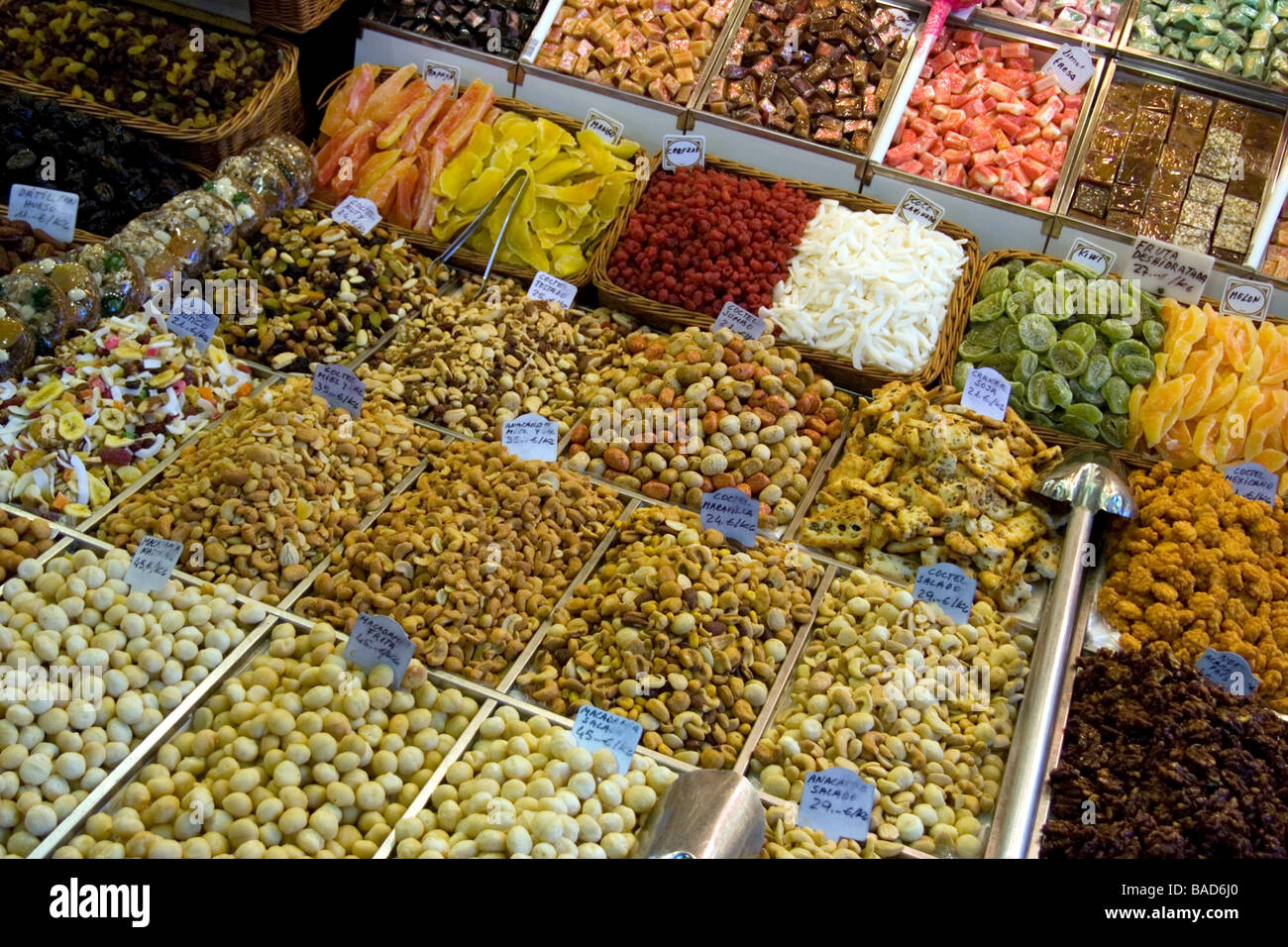Sweets and nuts for sale in market Stock Photo - Alamy