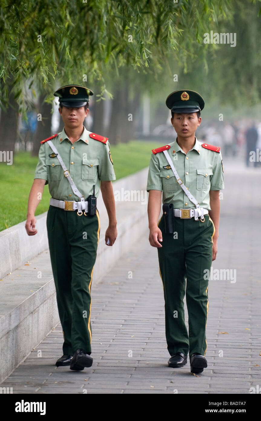 Police officers patrol Zhongshan Park outside Forbidden City, Beijing ...