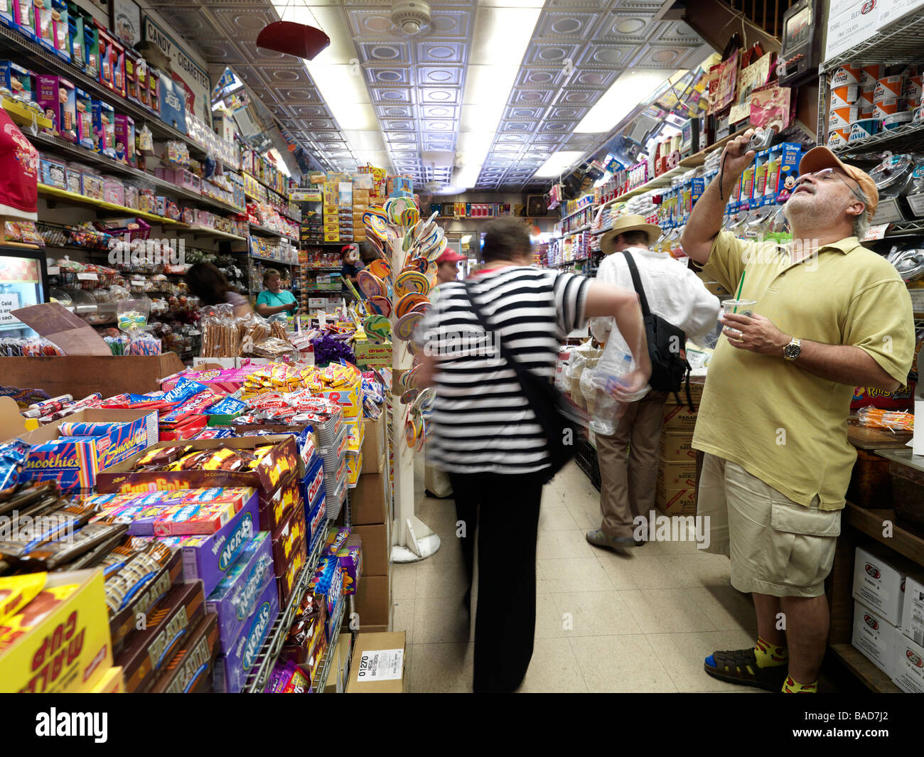 People shopping in a candy store on the Lower East Side in New York ...