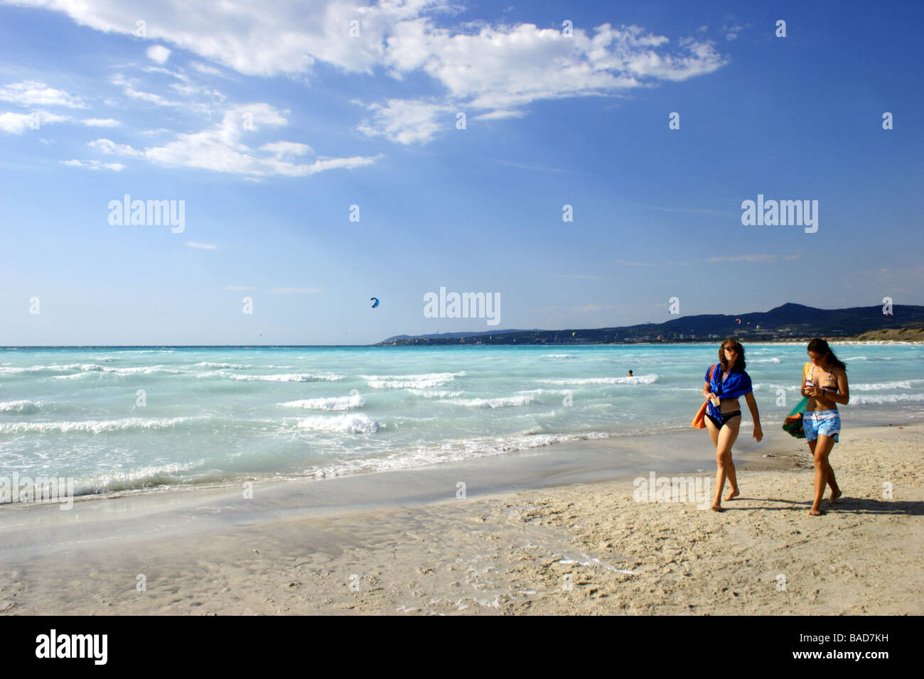 Two friends on the beach Stock Photo - Alamy