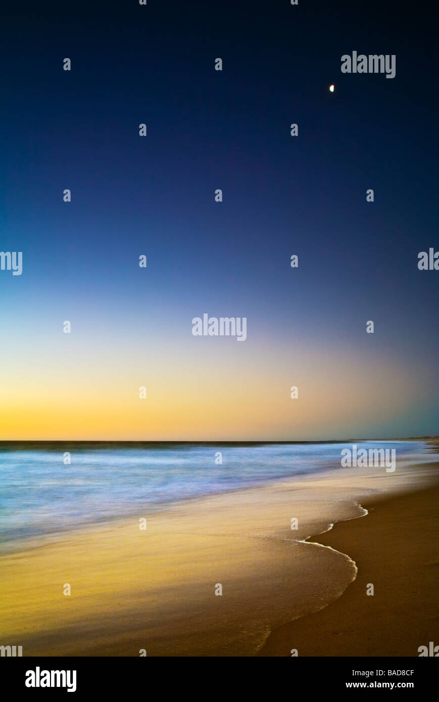 Very colorful simplistic landscape of a beach at dusk complimented by ...