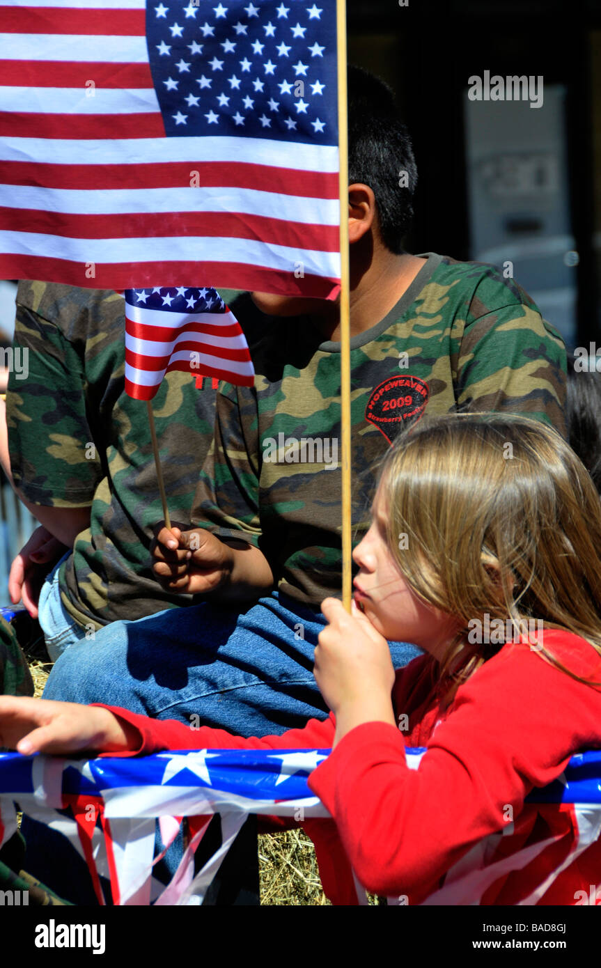 White girl with flag on Patriotic Float in Strawberry Festival Parade ...
