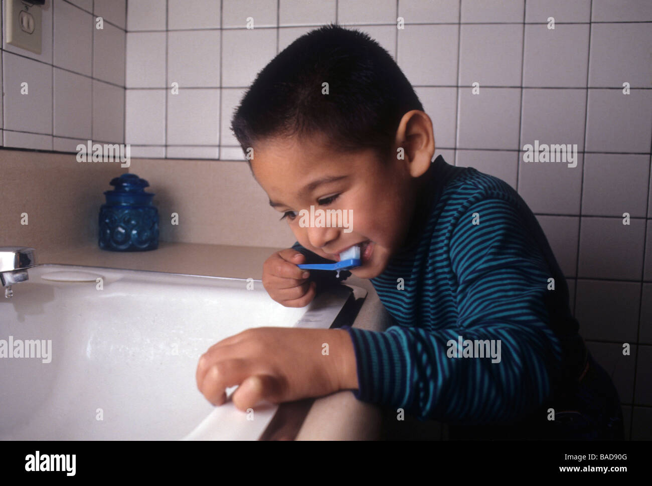 Hispanic boy brush teeth hygiene clean care health oral dental Stock ...