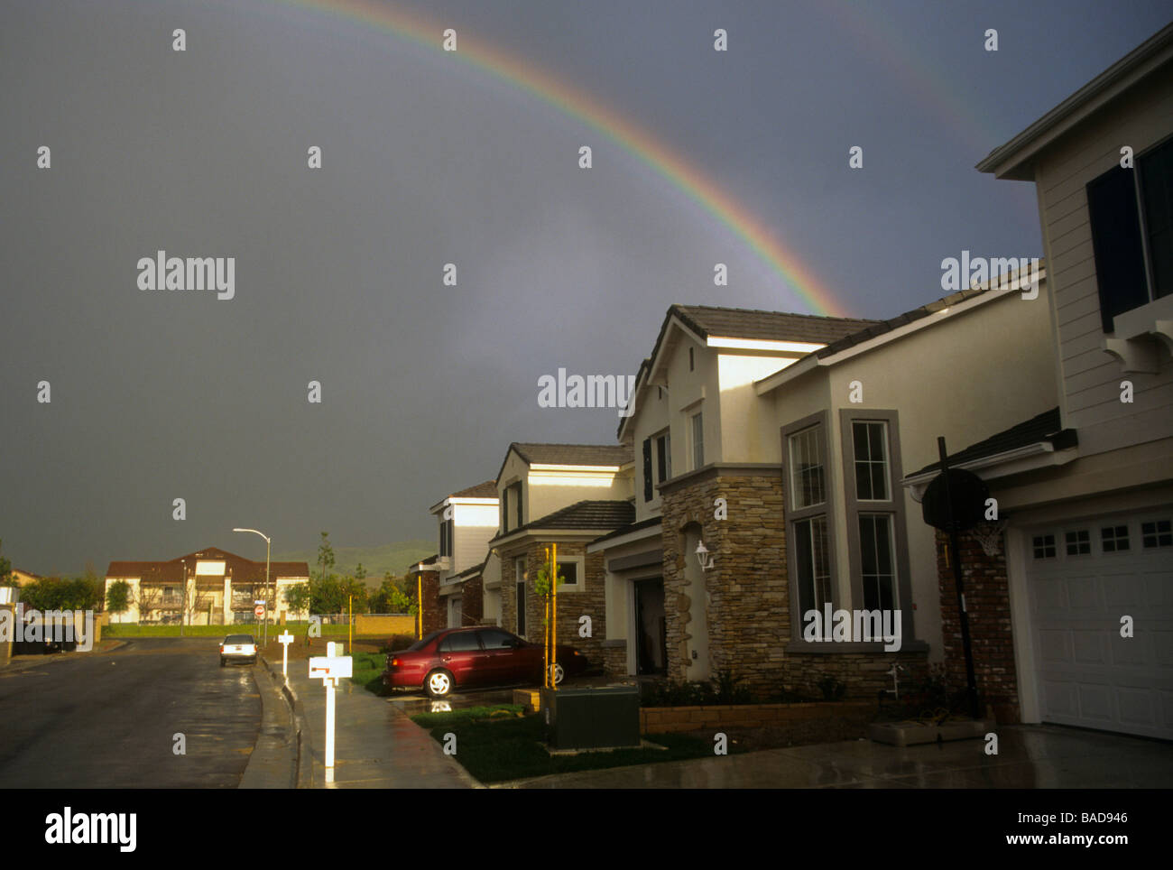rainbow sky house home street residence rain storm color spectrum ...