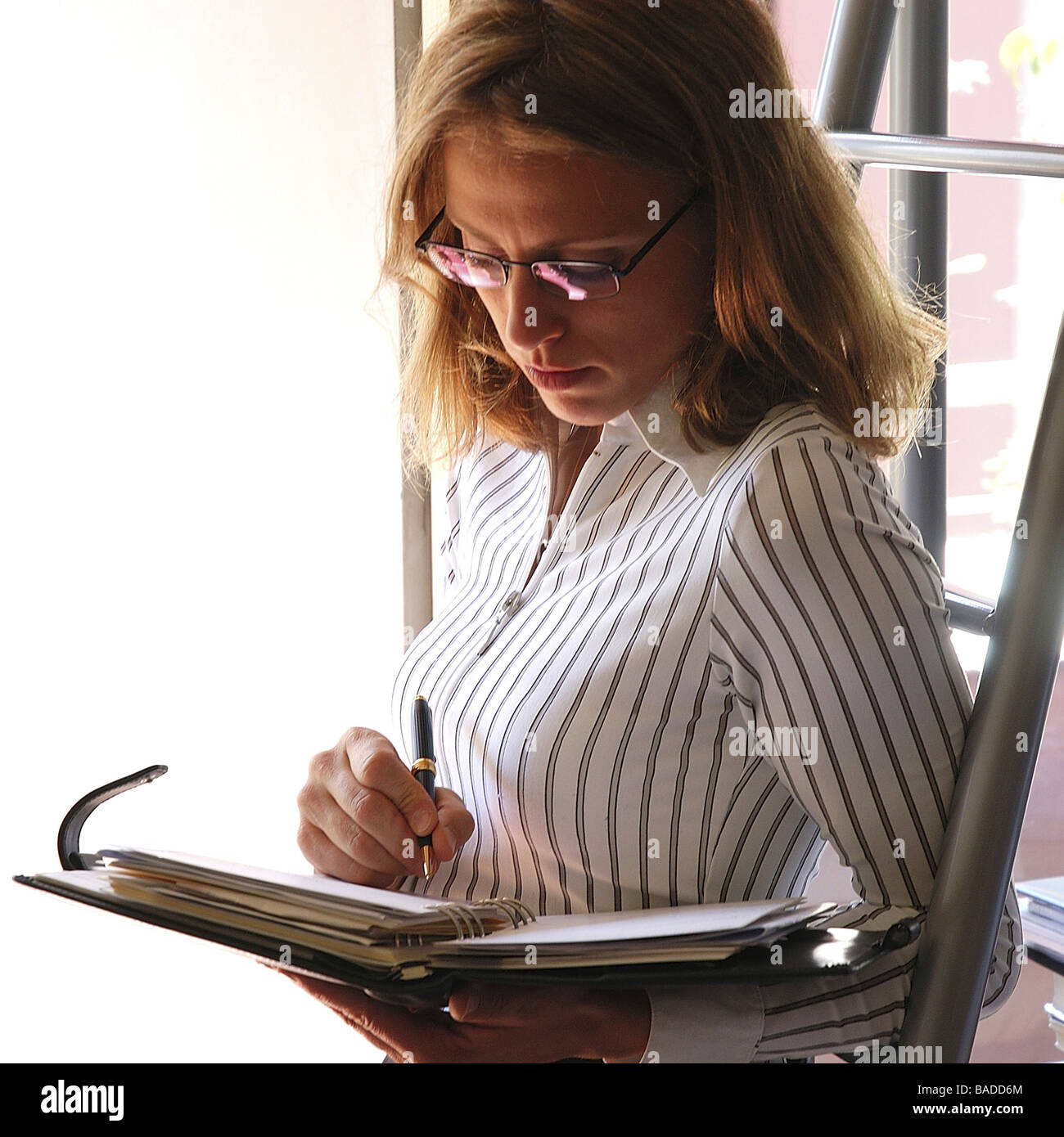 Secretary with diary Stock Photo - Alamy