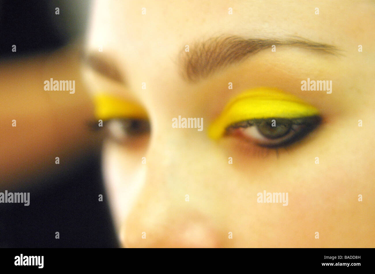 Yellow eye liner Stock Photo - Alamy