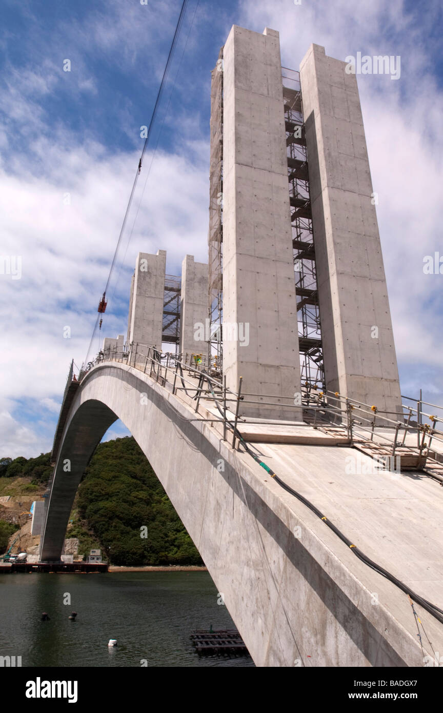 Construction of Kashirajima Bridge with concrete arch built using Melan ...