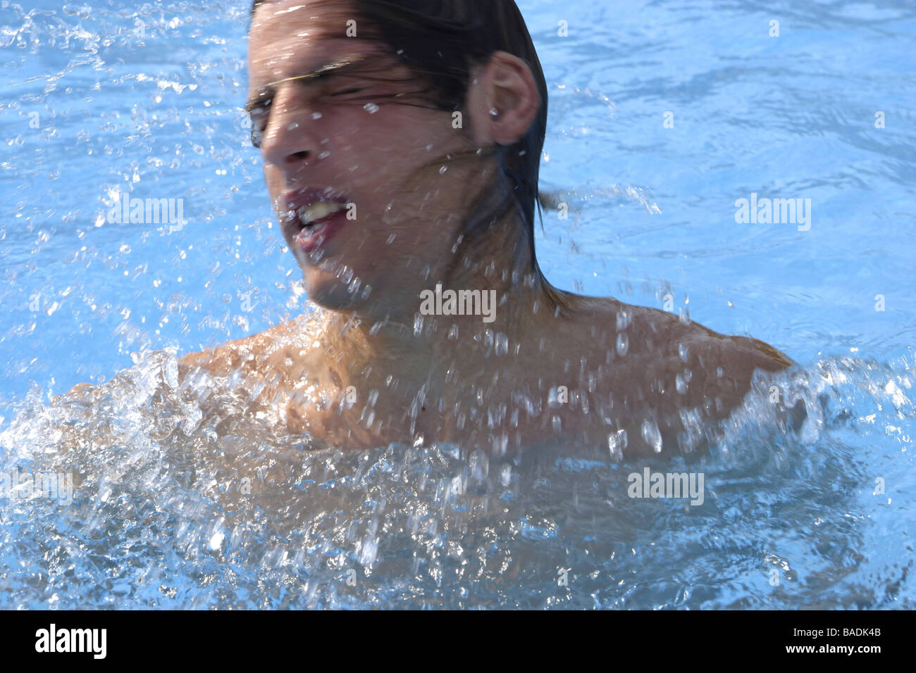 Shaking head in pool Stock Photo - Alamy