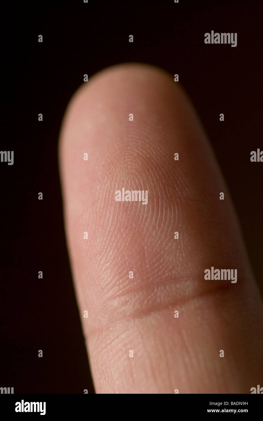Close up of a man's index finger against a black background Stock Photo ...