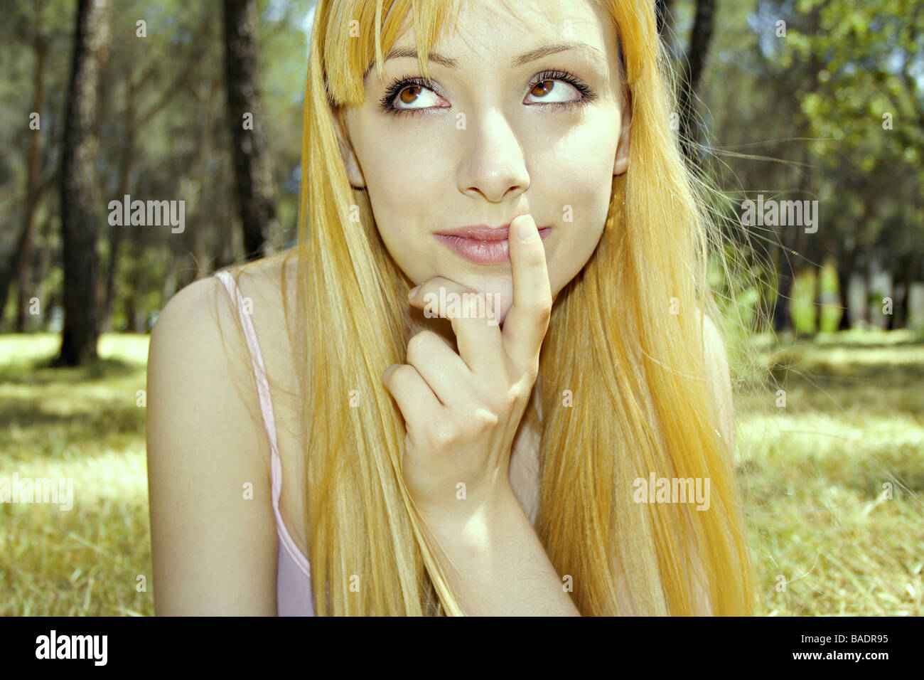 Young woman thinking Stock Photo - Alamy