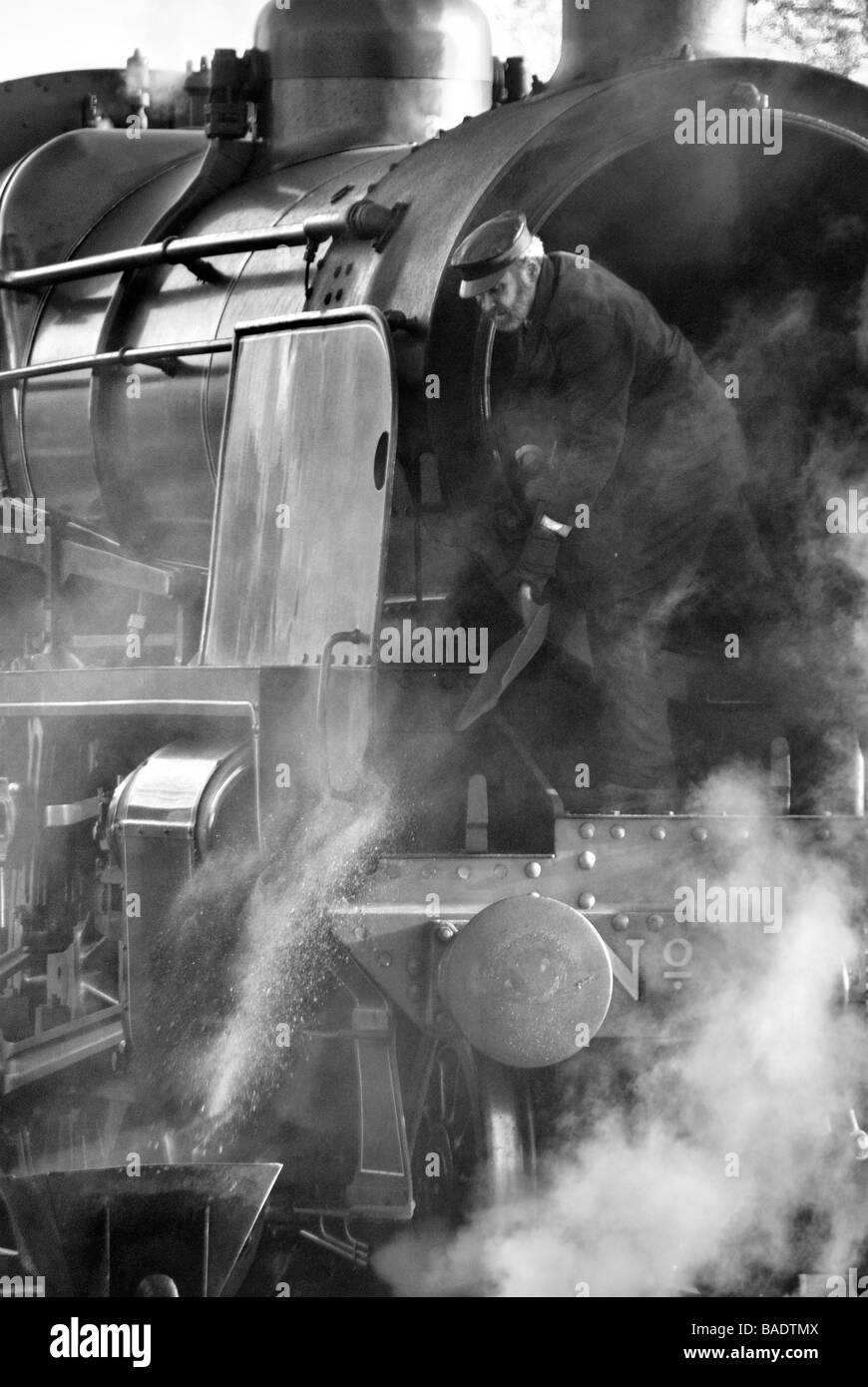 loco fireman cleans out smokebox of engine at Bluebell Railway Stock ...