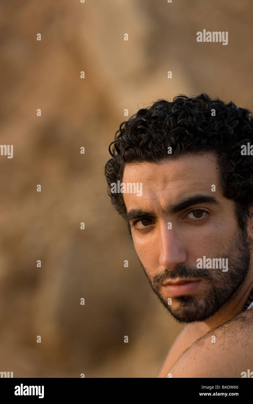 Unhappy Middle Eastern man outdoors Stock Photo - Alamy