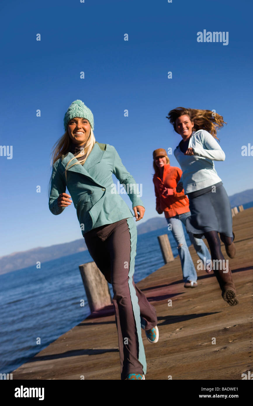 Friends Running on Dock, Lake Tahoe, California, USA Stock Photo - Alamy