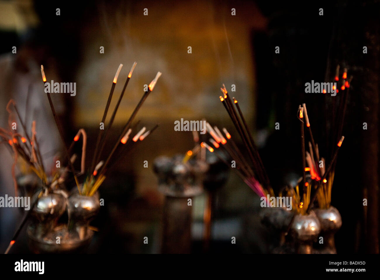 Incense sticks burn at a Sufi shrine in Delhi's Nizamuddin muslim area ...