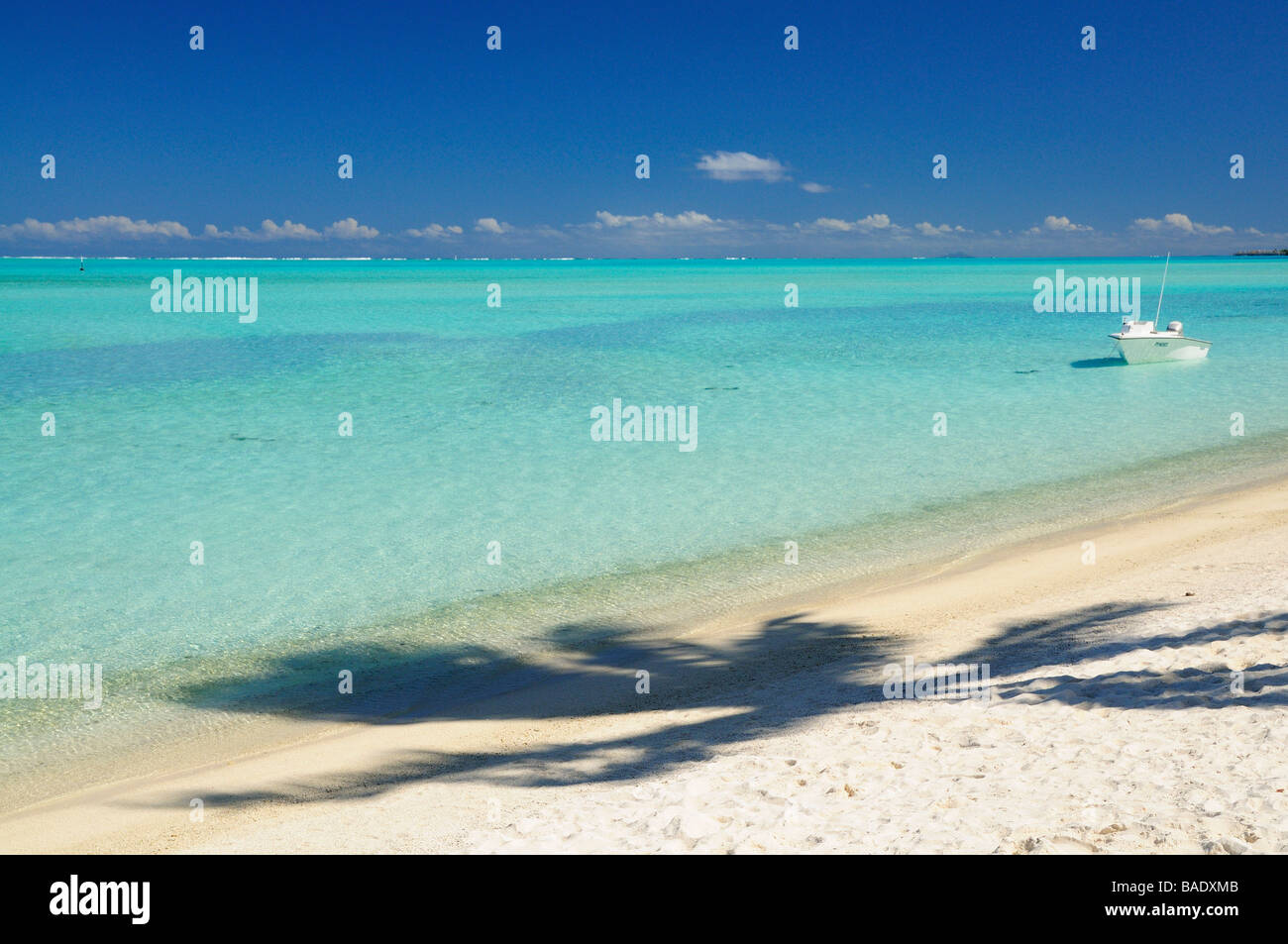 Boat in Water by Beach, Matira Beach, Bora Bora, French Polynesia Stock ...