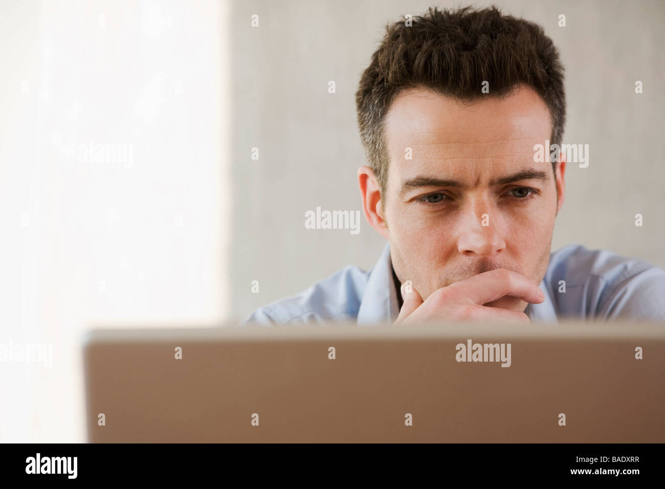 looking iat laptop screen Stock Photo - Alamy