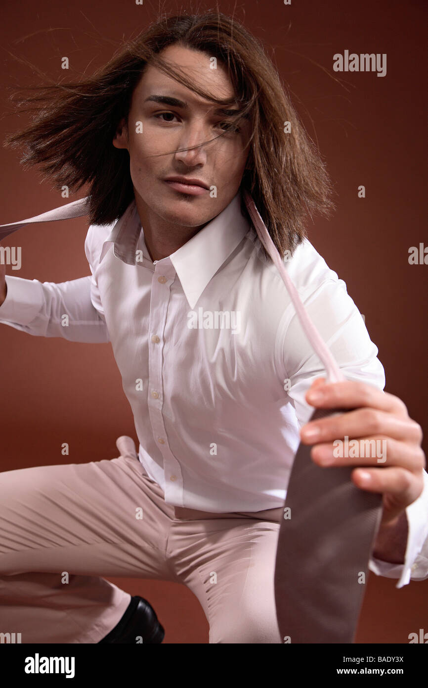 Person posing squatting studio hi-res stock photography and images - Alamy