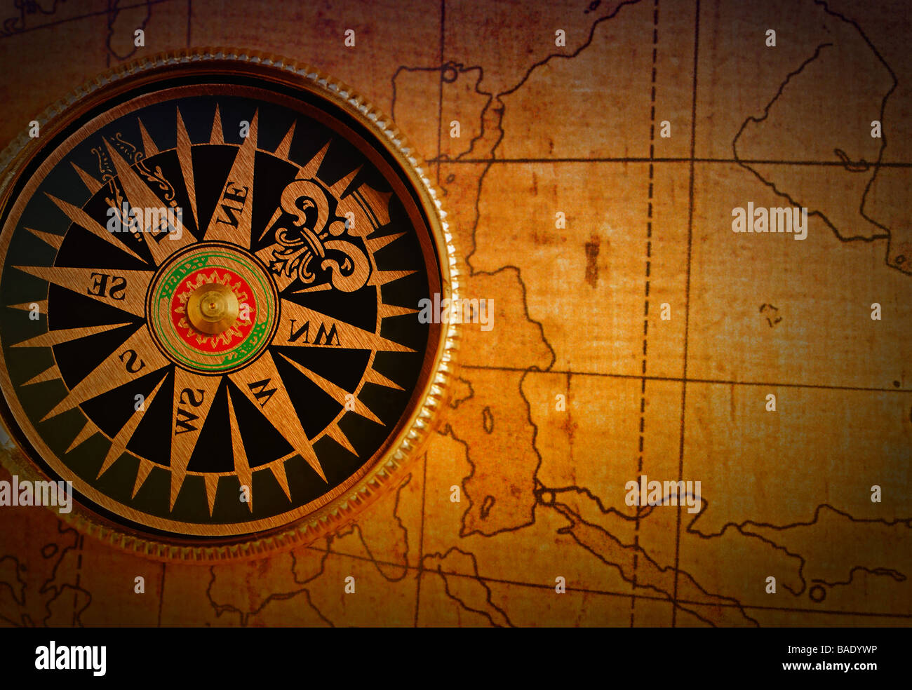 Old compass and map background Old gold color Stock Photo - Alamy