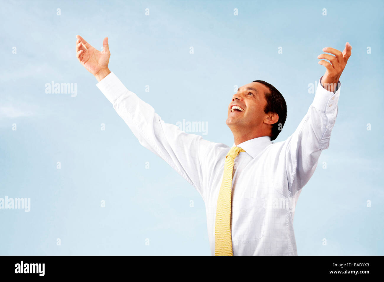 business man looking happy with his freedom outdoors Stock Photo - Alamy
