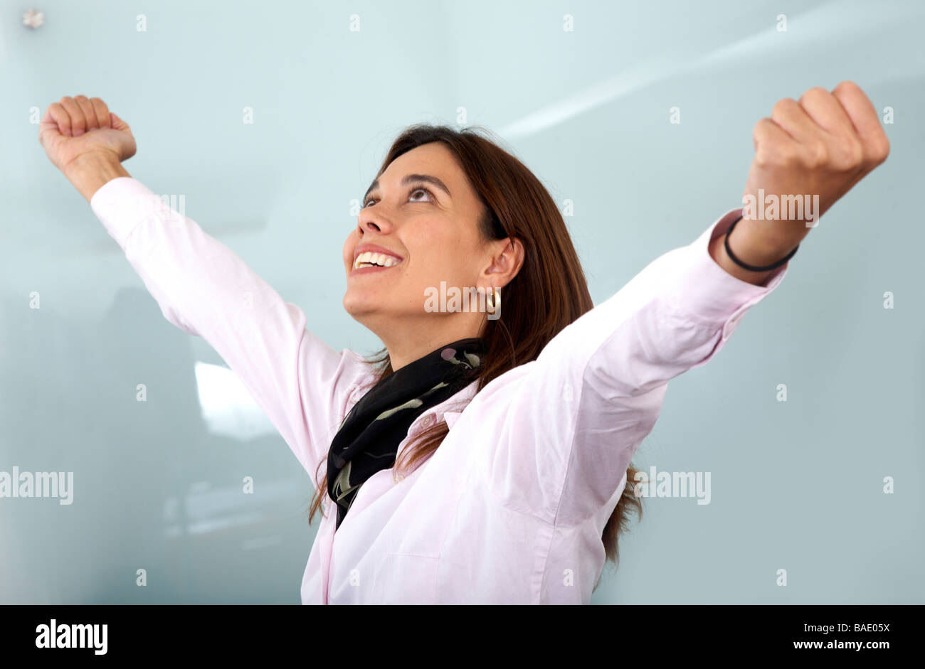 business successful woman smiling at her office Stock Photo - Alamy