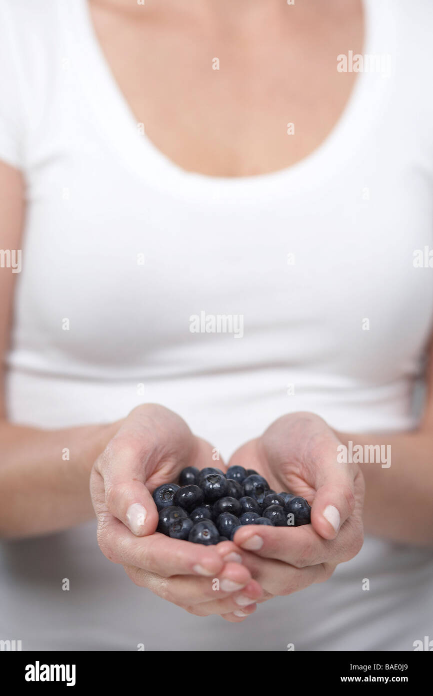 Woman Holding Fruit Stock Photo - Alamy
