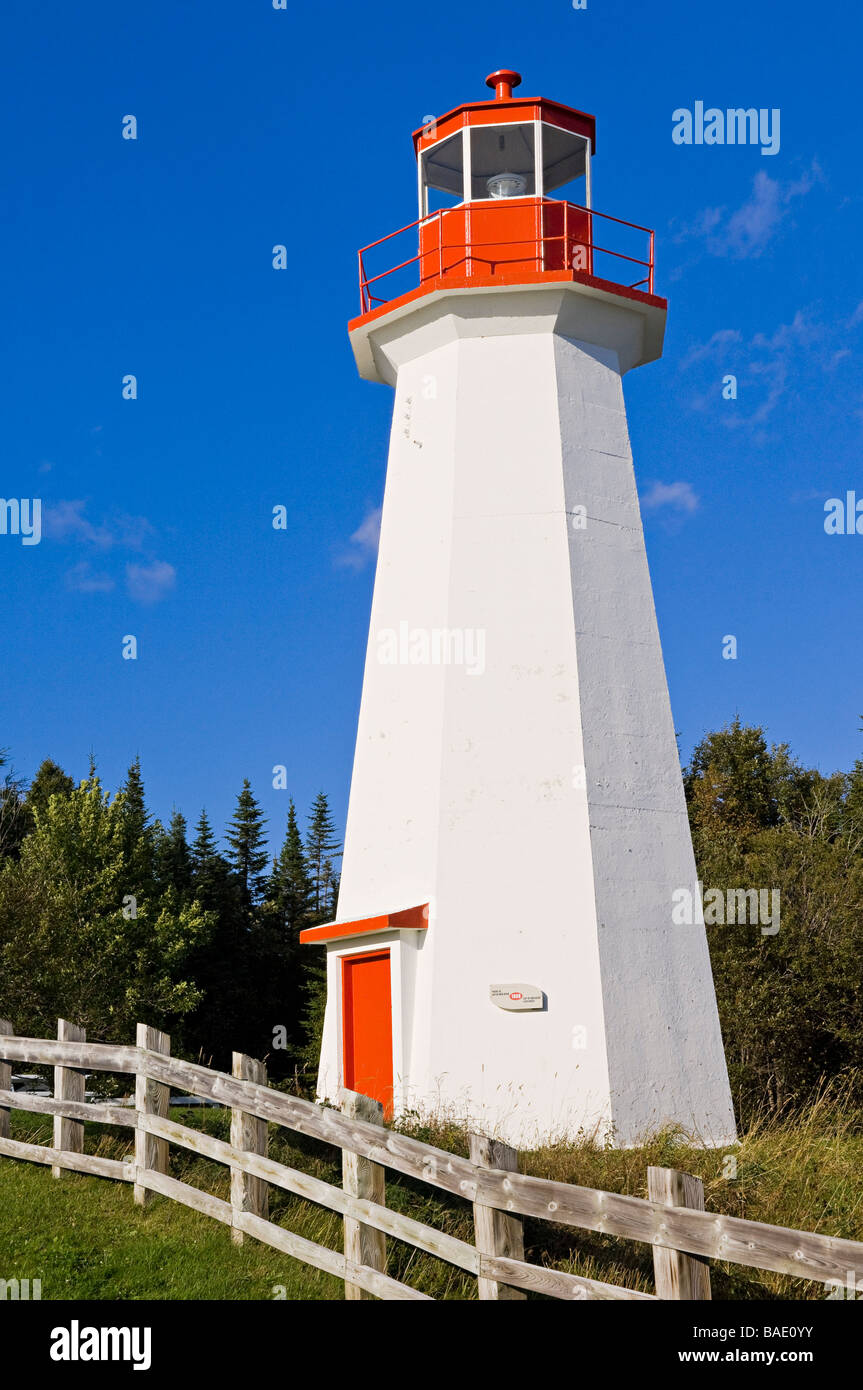 Lighthouse by Fence, Grande Bergeronne, Cote Nord, Quebec, Canada Stock ...