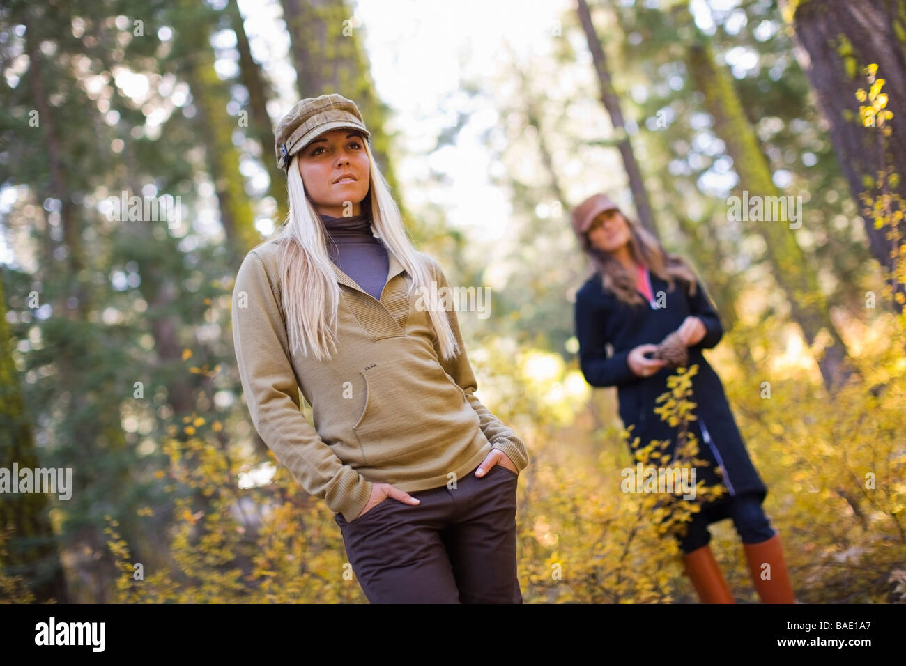 Two Women in Forest Stock Photo - Alamy