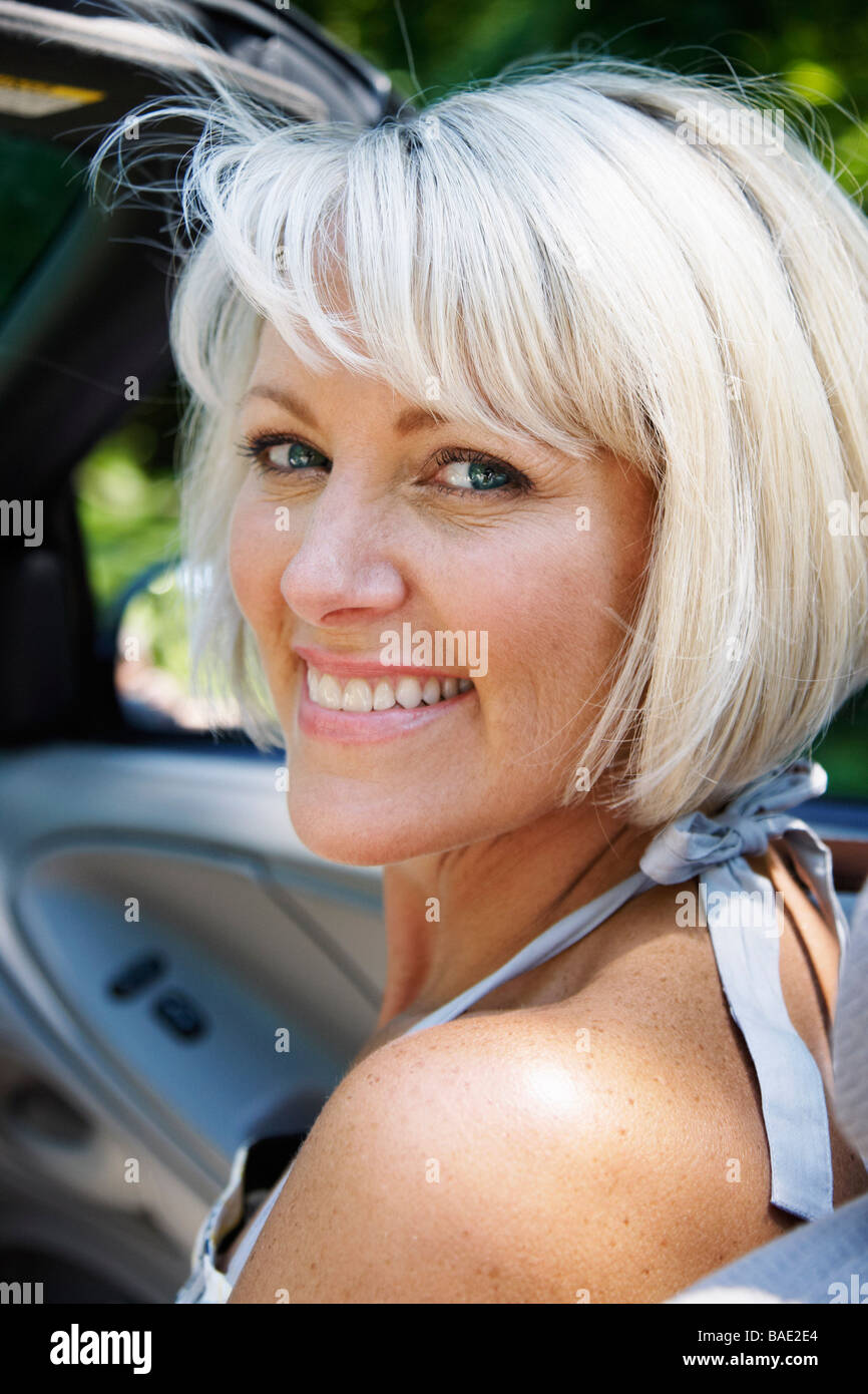 Woman Looking Over Shoulder Stock Photo - Alamy